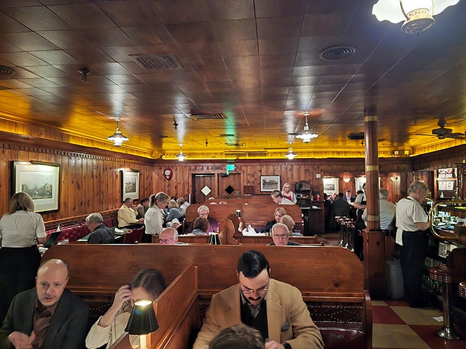 The dining room hums with the soundtrack of satisfaction—clinking glasses, murmured appreciation, and the occasional gasp of steak-induced delight.