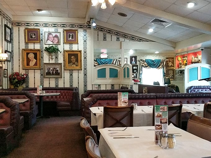 The dining room feels like a museum of family memories, where every portrait tells a story and every booth has hosted countless celebrations.