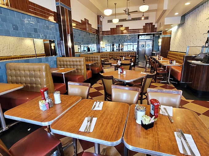 Those wooden tables have heard more New York stories than a taxi driver. Each booth practically hums with decades of conversations.