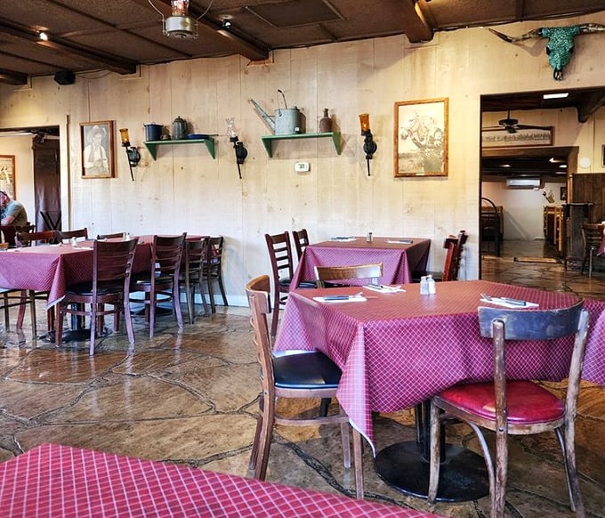 Those red checkered tablecloths aren't just decoration—they're time machines to when restaurants valued character over corporate consistency.