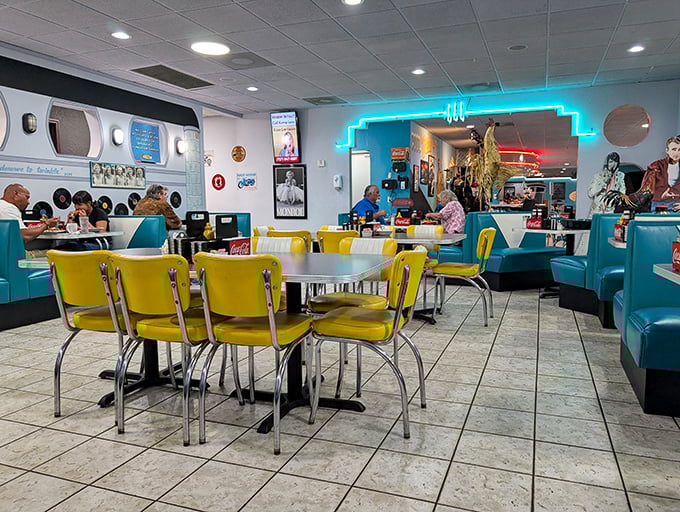 The diner's retro charm extends to every corner, where turquoise and yellow booths invite you to settle in for something special.