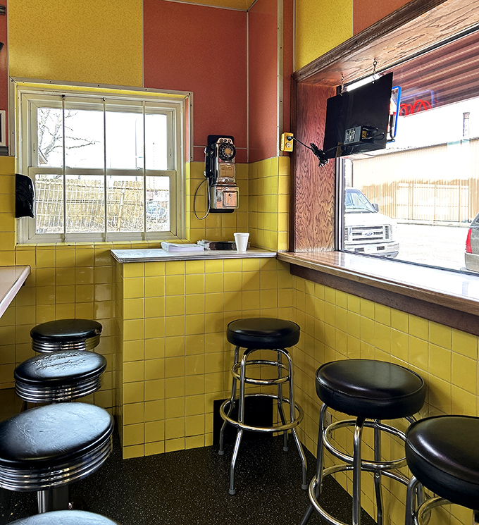Yellow tile walls and classic counter stools create the perfect backdrop for morning conversations that range from Vikings disappointments to weather predictions.
