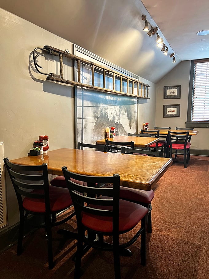 The dining area features an authentic fire ladder on the wall—because after eating this BBQ, you might need someone to rescue you from food bliss.