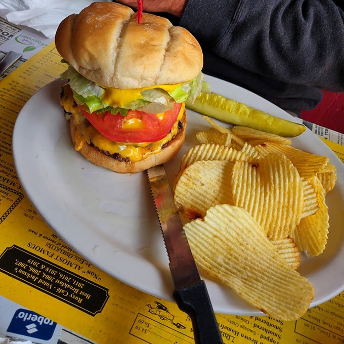 Two patties, double cheese, and enough toppings to make your cardiologist weep tears of both joy and concern.