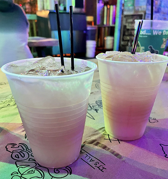 Frosty drinks in plastic cups—unpretentious vessels for vacation-worthy refreshment. Sometimes paradise comes with a straw.