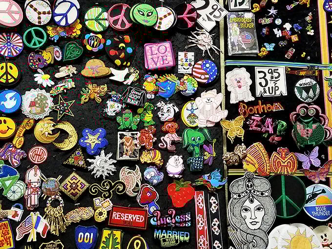 A galaxy of pins and patches telling stories of peace, love, and occasional snarkiness—wearable opinions for under $5.
