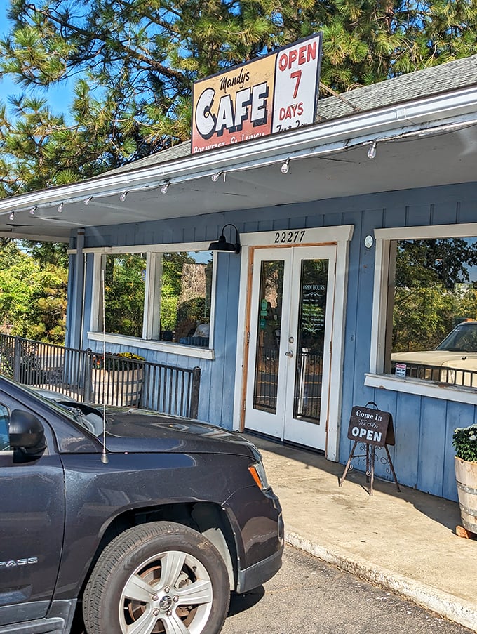 The "Open 7 Days" sign might as well read "Abandon diet, all ye who enter here"—a blue beacon of breakfast bliss.
