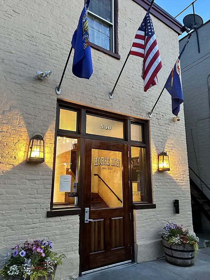 The Horse Inn's entrance feels like discovering a secret club – the kind where everyone who enters leaves happier and considerably more satisfied.