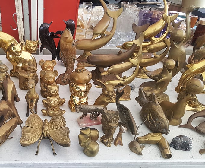 A menagerie of brass animals waiting for adoption. These shiny creatures don't need feeding—just occasional polishing and a prominent spot on your bookshelf.