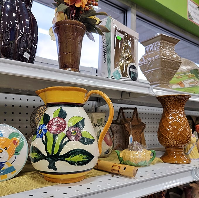 Hand-painted pottery and vintage vases line the shelves – each piece whispering stories of dinner parties past.
