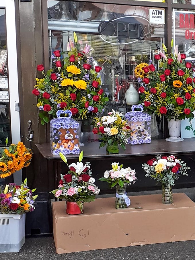 Fresh flowers greet shoppers at the entrance—a burst of color and fragrance that sets the tone for the sensory journey ahead.