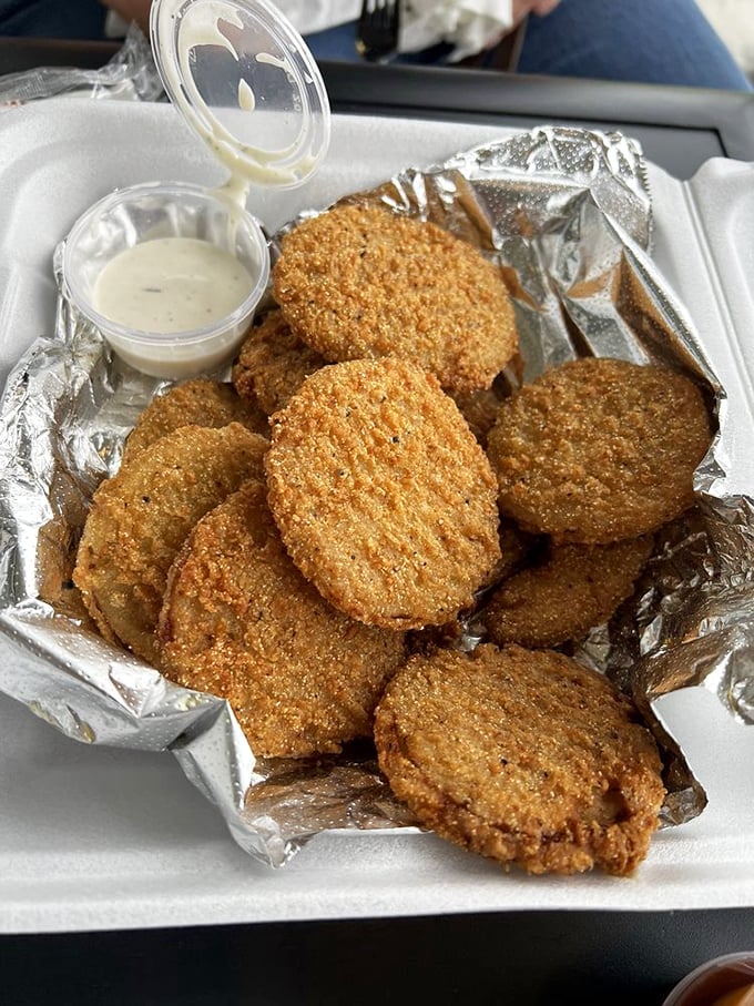 Fried green tomatoes with ranch dipping sauce—the South's answer to mozzarella sticks. Crispy, tangy, and utterly addictive.