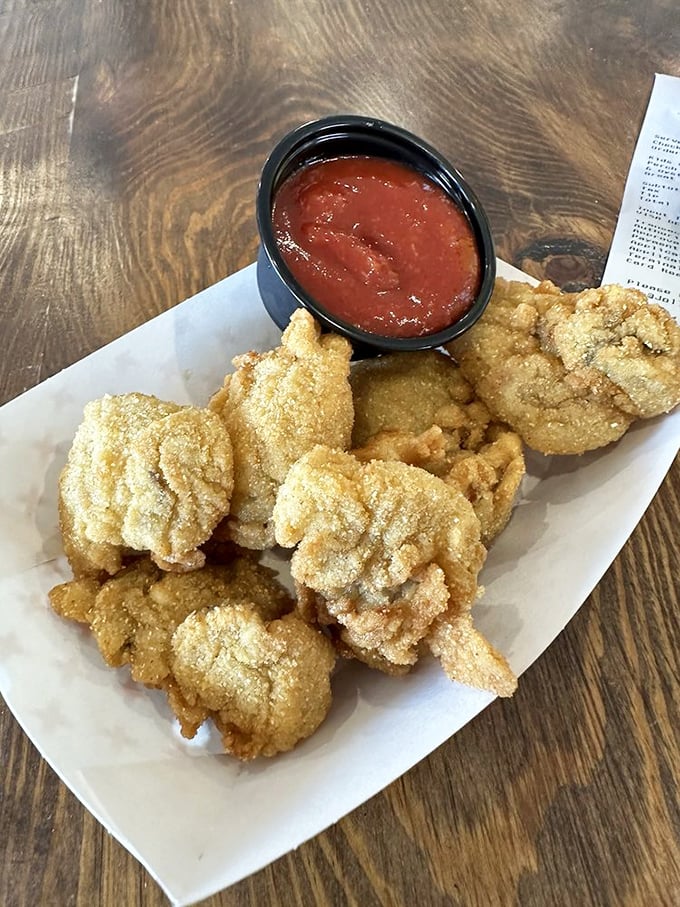 These aren't just fried oysters—they're little cornmeal-crusted miracles. Dip one in that marinara and tell me you don't believe in love at first bite.