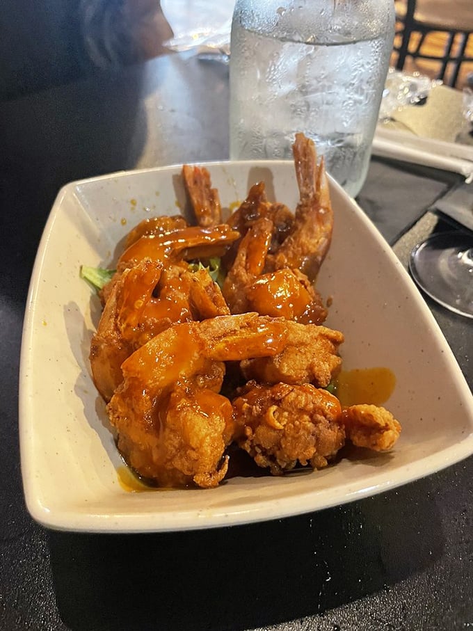 These fried shrimp aren't just appetizers—they're little crustacean miracles, perfectly seasoned and fried to the kind of crispiness dreams are made of.