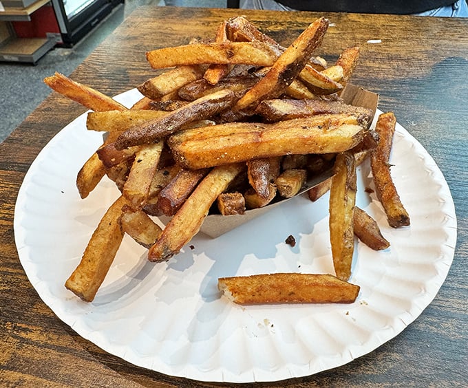 Golden, crispy fries that crackle with each bite – the perfect supporting actor to the sandwich superstar in this culinary blockbuster.