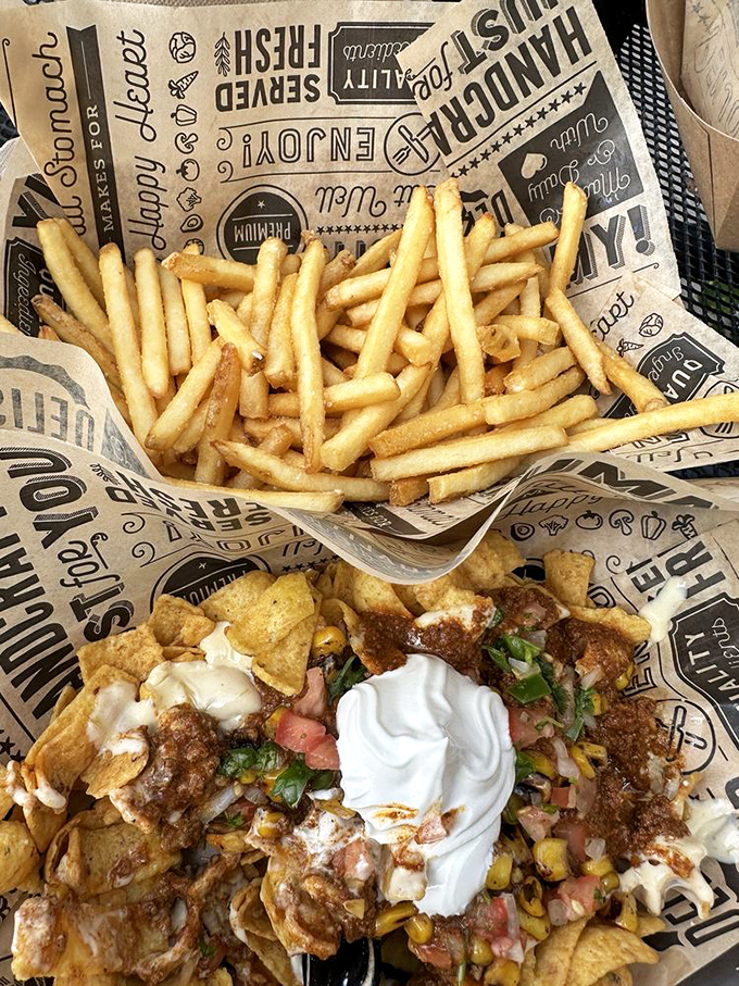 Frito Pie elevated to art form – crunchy, cheesy, spicy perfection that makes you question why you'd eat chips any other way.