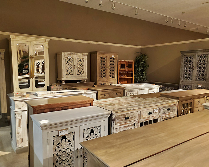 Farmhouse chic furniture gallery where distressed finishes and intricate woodwork tell stories of craftsmanship rarely found in big box stores.