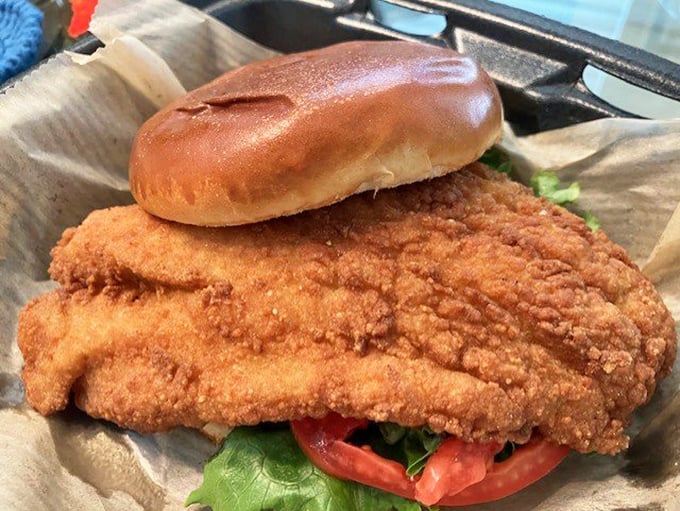 A fried fish sandwich that could make a pescatarian weep with joy. That golden crust is the stuff of crispy dreams.