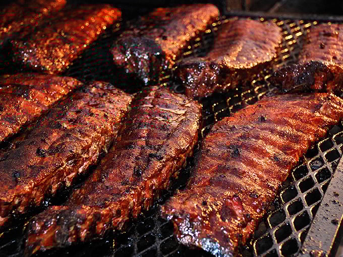 The moment of transformation—when pork ribs meet smoke and fire in a dance as old as time, creating the magic that keeps Memphis on the culinary map.