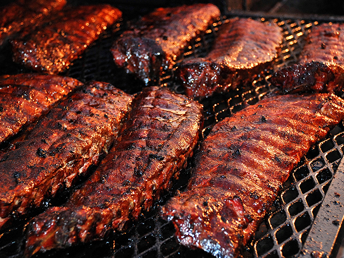 The moment of transformation—when pork ribs meet smoke and fire in a dance as old as time, creating the magic that keeps Memphis on the culinary map.