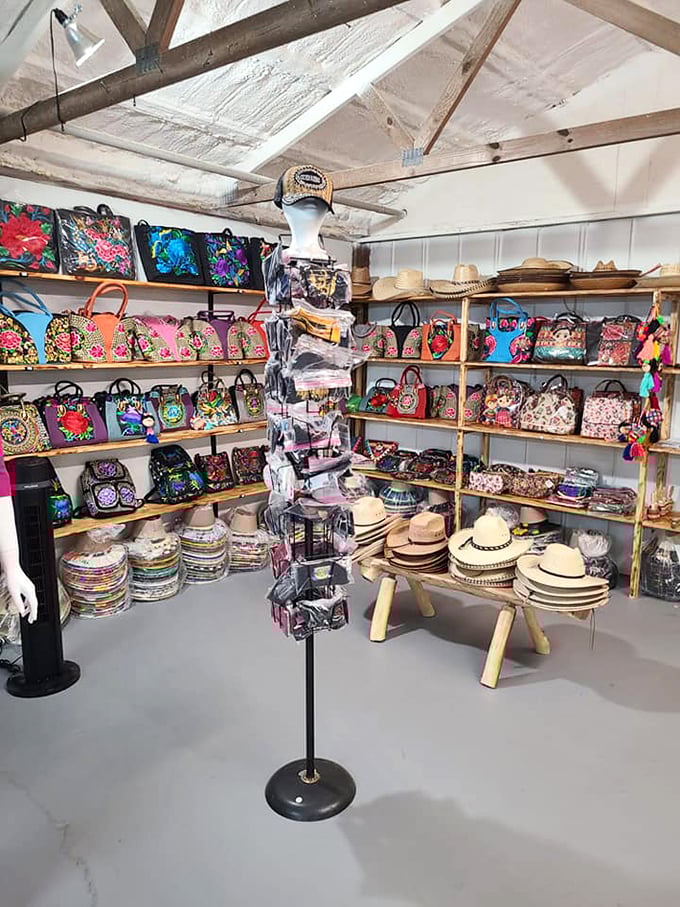 Hat and bag heaven! This color explosion of accessories proves that sometimes the perfect finishing touch for your outfit has been waiting at a flea market all along.