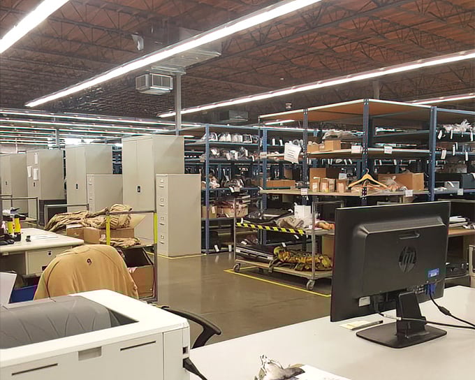 The back-of-house operations—where donations transform into organized chaos before making their bin debut.