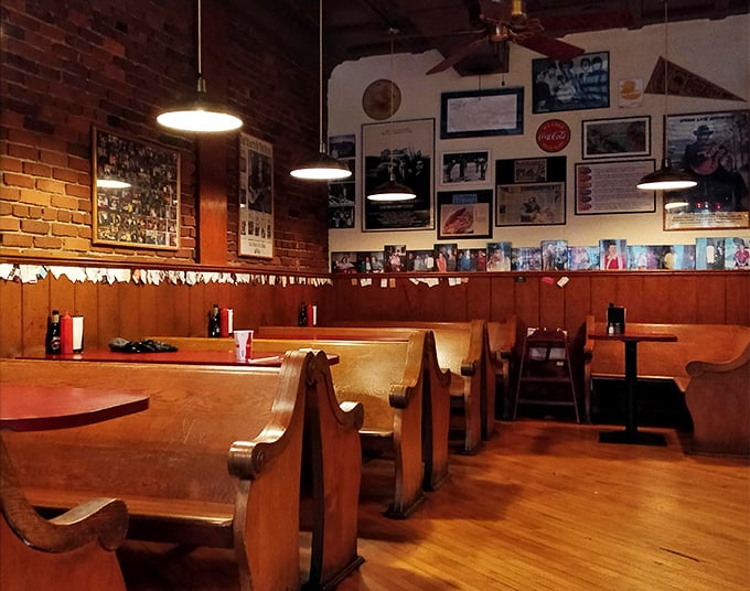 Church-like wooden booths where sandwich worship happens daily. The congregation gathers for the gospel of good eating.