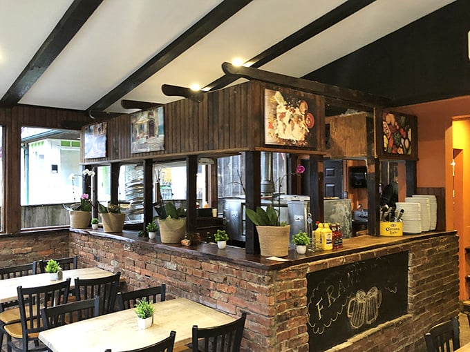 Exposed brick and warm wood create a haven for comfort food enthusiasts. This bar area feels like it's been waiting for you all along.