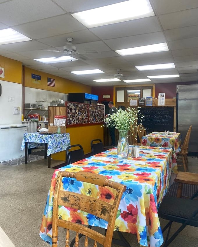 The dining room feels like being invited to someone's home—if that someone happened to be an extraordinary cook with a penchant for cheerful tablecloths and warm hospitality.
