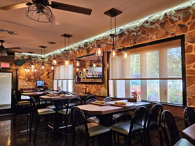 Another dining room angle reveals more stone, more warmth, and more reasons to extend your stay past dessert.