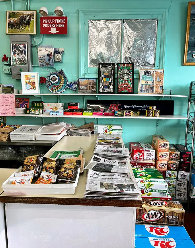 Newspapers, candy, and sodas line the shelves – because great fish deserves great reading material and something sweet to follow.