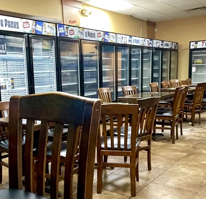 A glimpse into the dining area where countless Pittsburgh pizza pilgrimages have ended in satisfied smiles and empty plates.