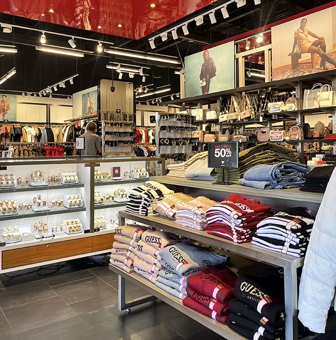Guess store perfection – where folded t-shirts and organized displays make you momentarily believe you could maintain this level of order in your own closet.