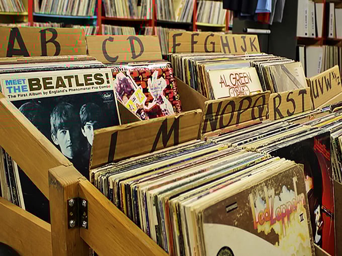 Vinyl heaven organized alphabetically – where Beatles albums sit patiently waiting for someone to give them a spin on a turntable that's probably also for sale somewhere here.