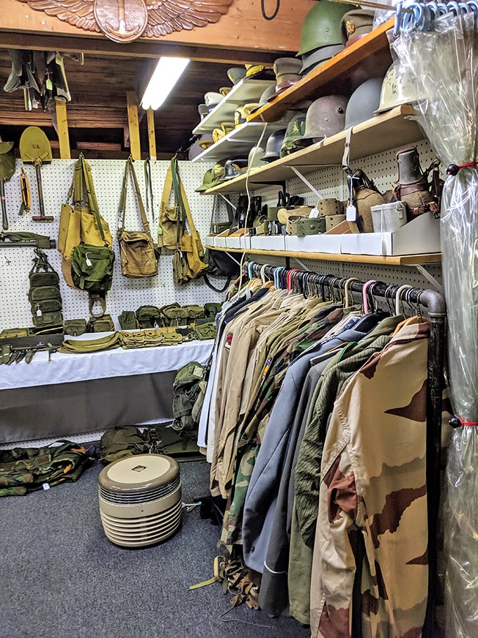 Military history preserved with respect and precision. Each uniform and helmet represents someone's service, carefully displayed for a new generation.