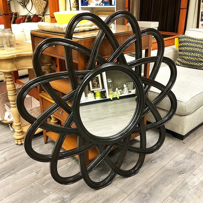 Mirror, mirror on the wall, who's the most distinctive of them all? This flower-shaped stunner transforms ordinary reflections into artistic statements.