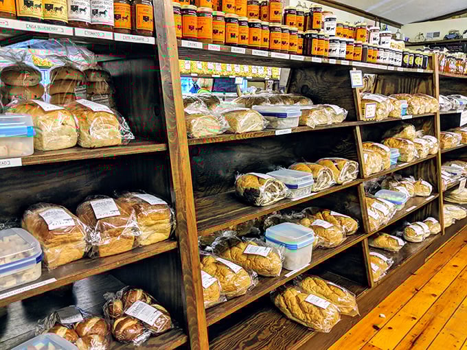 Bread heaven exists, and it has wooden shelves. Each loaf represents the difference between merely eating and truly living—wrapped in plastic for your convenience.