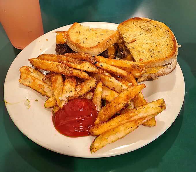 The patty melt—that glorious marriage of burger and grilled cheese—executed with the kind of precision that makes you wonder why you'd ever order anything else.