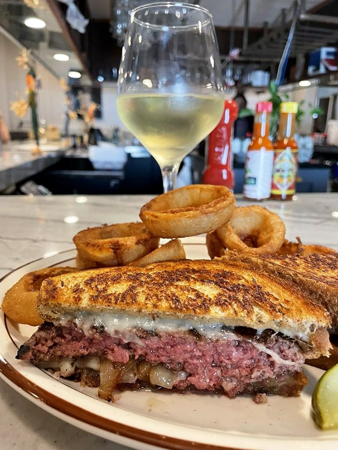 This patty melt isn't just a sandwich—it's an architectural achievement. The melted cheese and caramelized onions create a symphony of savory satisfaction.