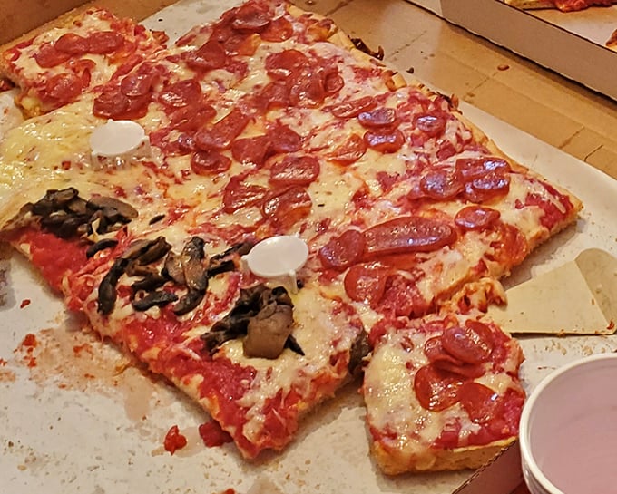 Half pepperoni, half mushroom—the compromise that's caused zero complaints in decades of marriage counseling via pizza.