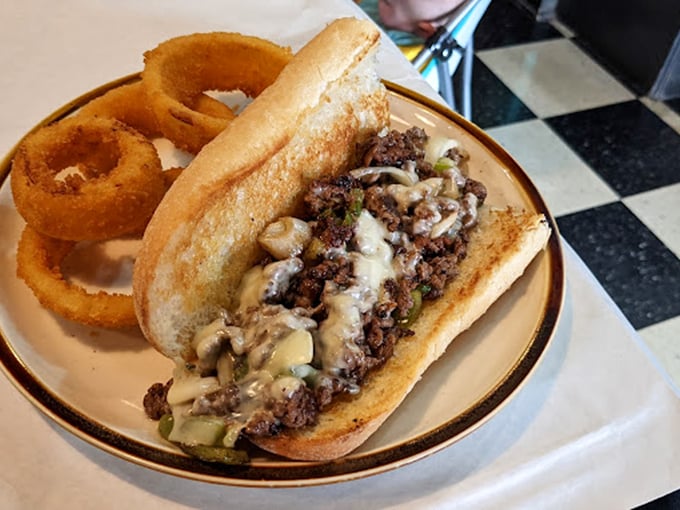 The Philly cheesesteak with onion rings doesn't just satisfy hunger—it obliterates it. This sandwich isn't messing around, and neither should your appetite.
