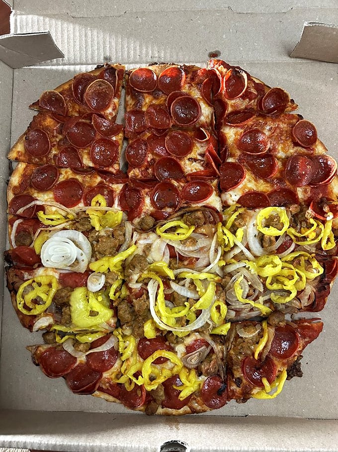 Half pepperoni, half "the works" – this pizza doesn't believe in making you choose between your cravings. The Switzerland of pizzas, bringing peace to dinner tables.