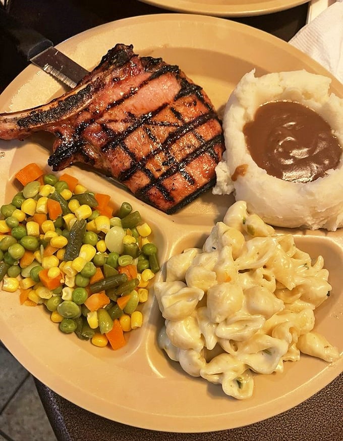 A pork chop dinner that proves sometimes the best things in life aren't complicated—they're just cooked with care and served with sides that complement perfectly.