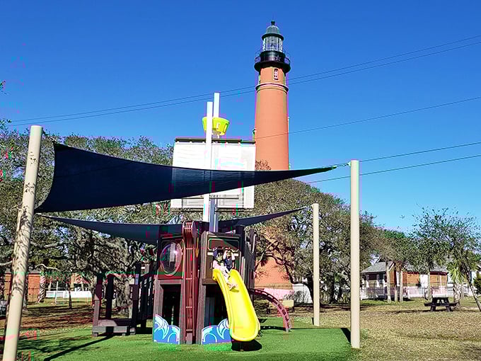 Even the playground nods to maritime heritage—because nothing says "educational fun" like sliding down from a miniature lighthouse while parents catch their breath.