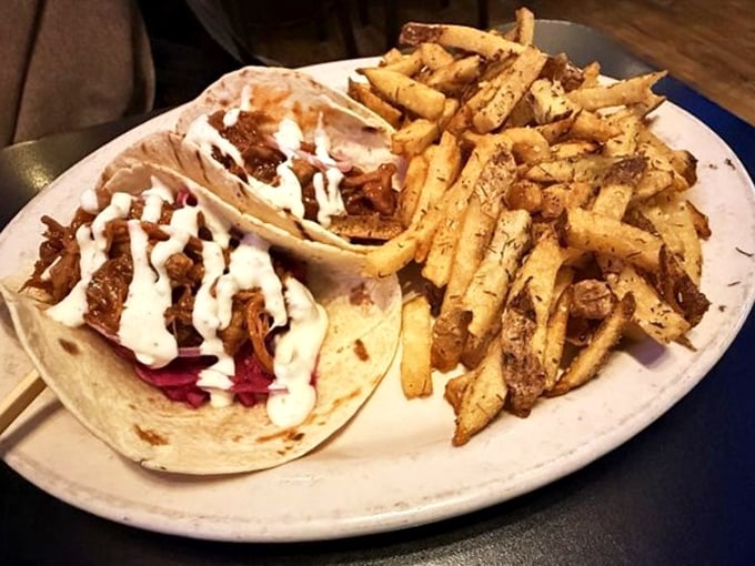 Tacos that don't need a passport to deliver authentic flavor. Those fries look like they've been working out—crispy, golden, and ready for action.