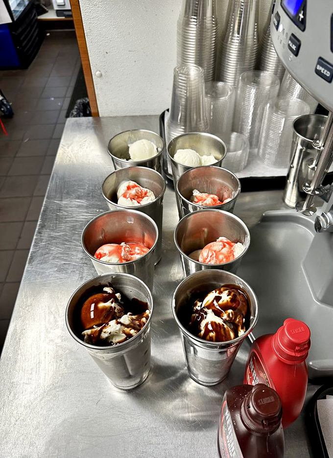Milkshake mise en place—the behind-the-scenes magic where ice cream dreams come true. Each metal cup holds potential happiness.