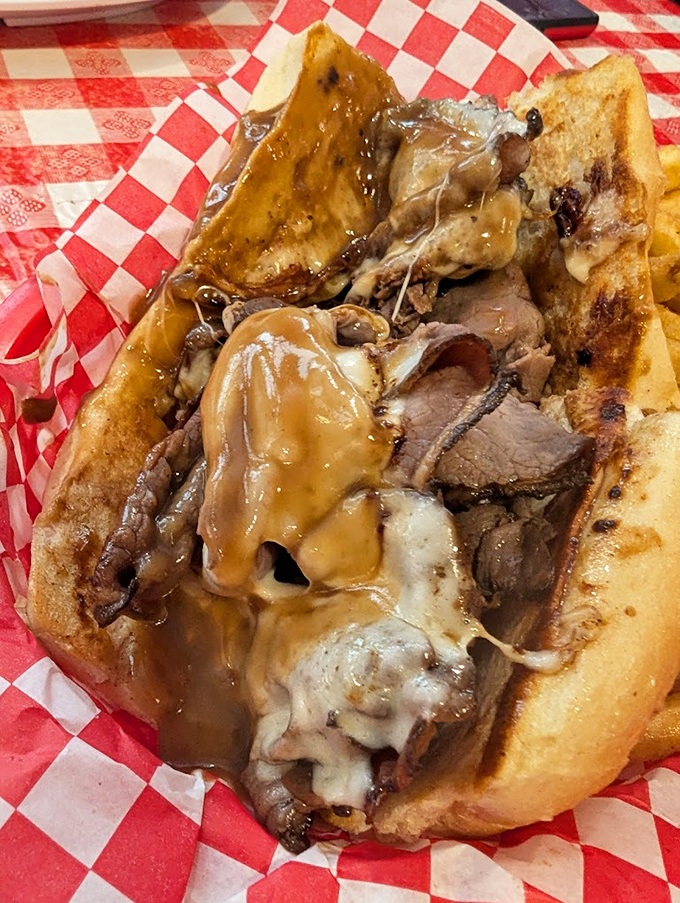 This isn't just roast beef—it's a gravy-soaked love affair on toast. The kind of sandwich that demands you cancel your afternoon plans for a proper food nap.