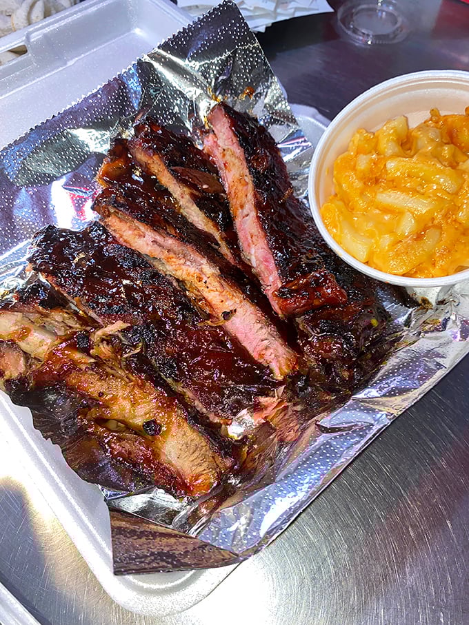 These ribs have that perfect "tug" that barbecue aficionados dream about—not falling off the bone (that's overcooked), but surrendering with just the right resistance.