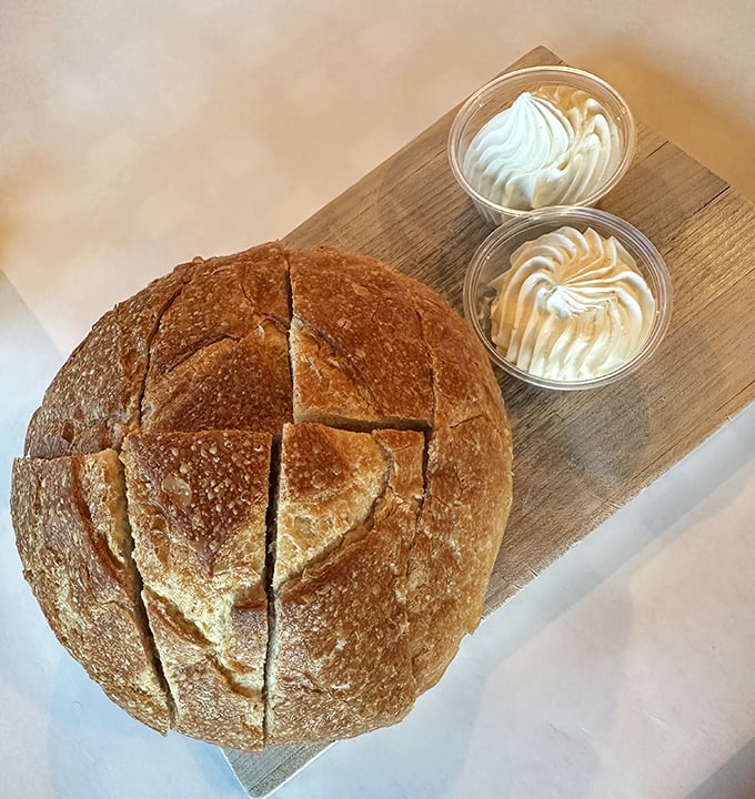 This sourdough bread bowl isn't just a vessel—it's destiny. Those two whipped butters standing by are patiently waiting for their moment to shine. 