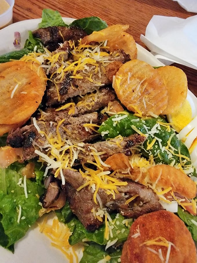 A steak salad that solves the eternal dilemma—yes, you can eat your greens and have your meat too, all on one glorious plate.